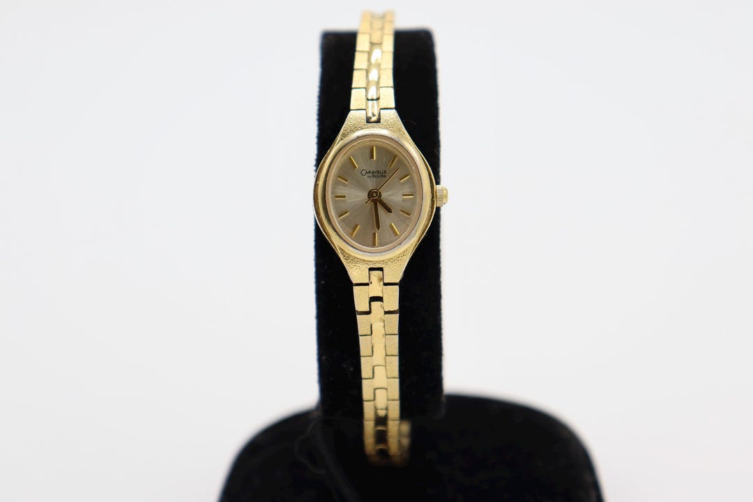 2005's CARAVELLE by BULOVA Watch, Stainless Steel Band, Golden Tone ...