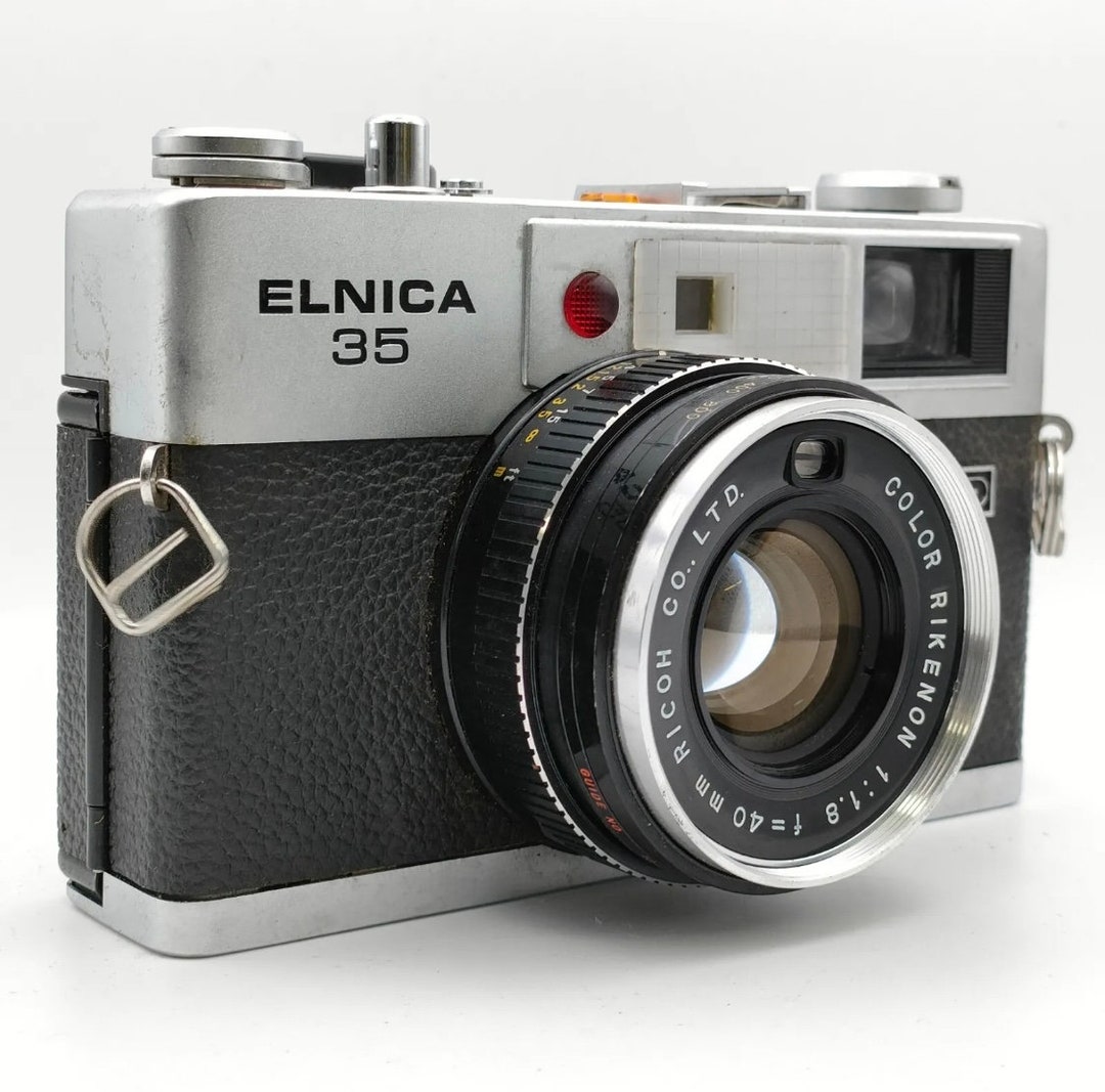 Ricoh Elnica 35 Silver 40mm F/1.8 Rangefinder 35mm Film Camera-made in Japan function Well ...