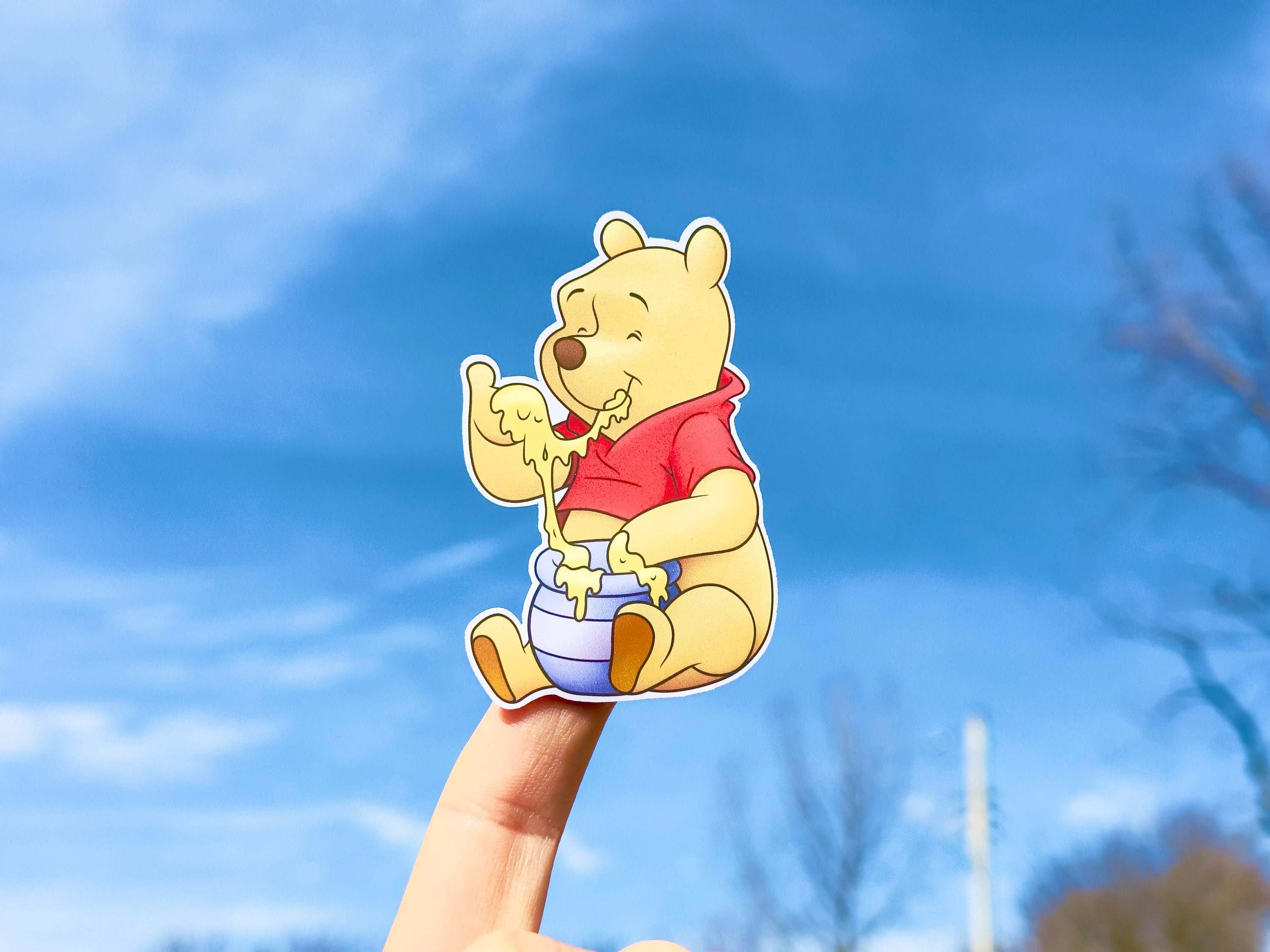 Winnie The Pooh Eating Honey