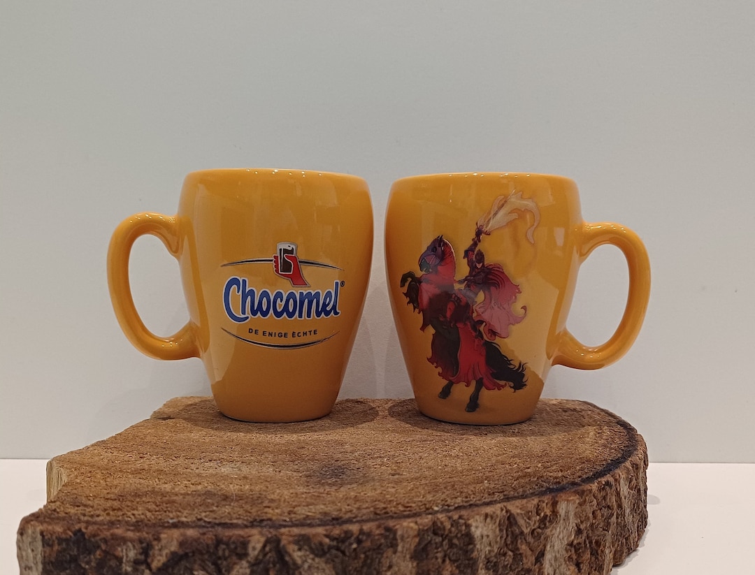 Chocomel - Efteling, a Yellow Mug With an Image of the Raveleijn Knight ...