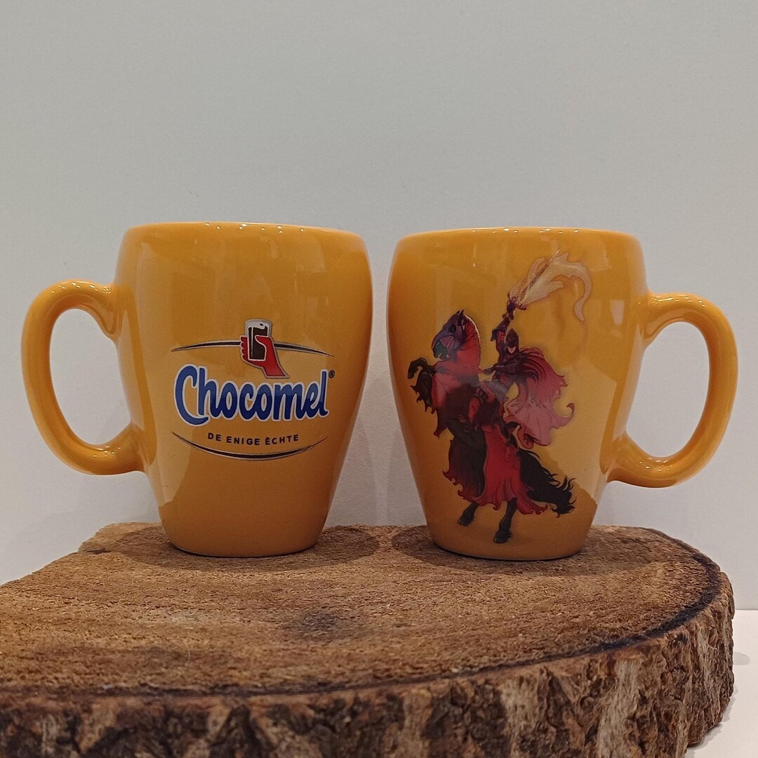 Chocomel - Efteling, a Yellow Mug With an Image of the Raveleijn Knight ...