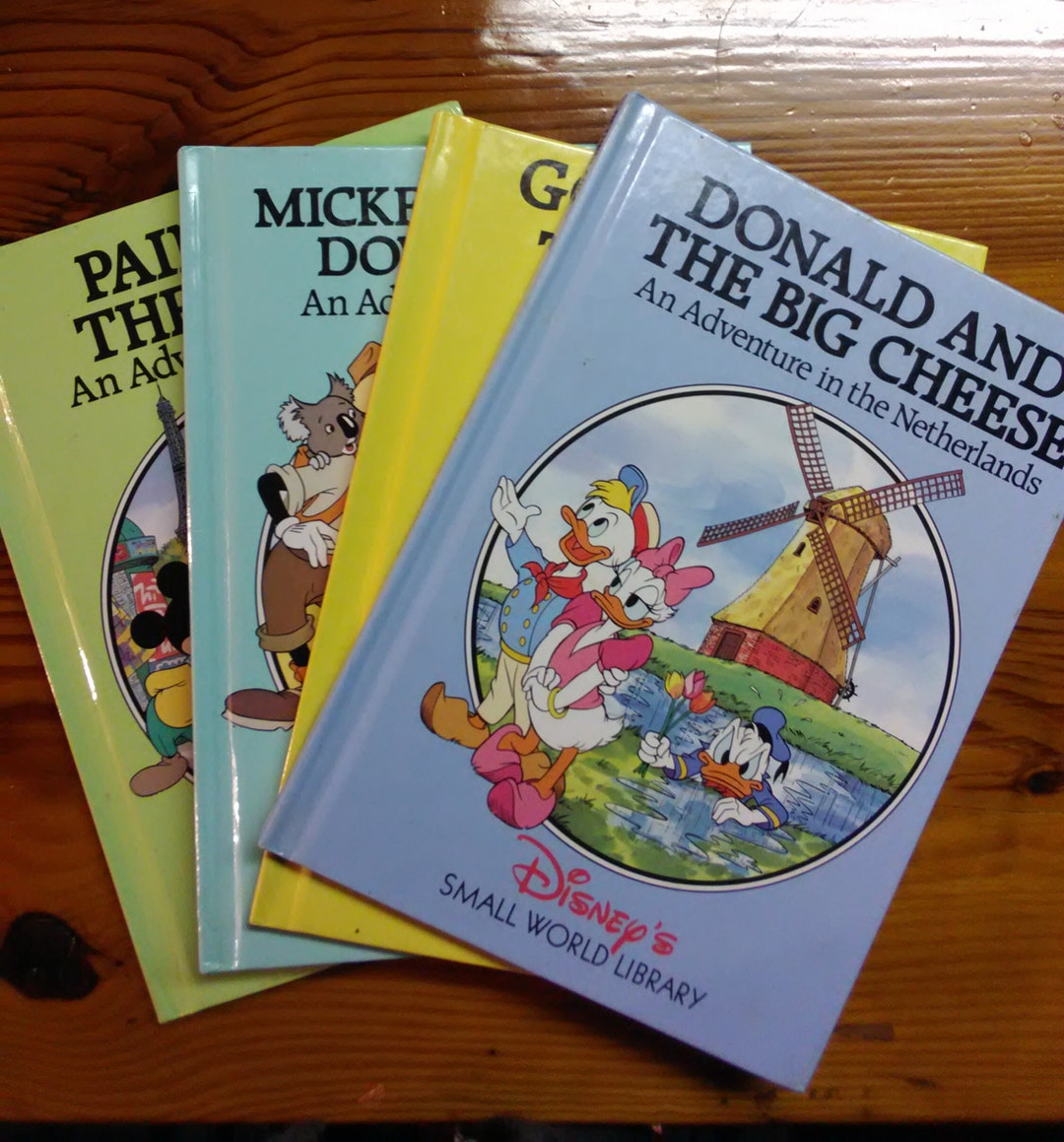 Vintage Set of 4 Disney's Small World Library, Donald, Goofy, Mickey ...