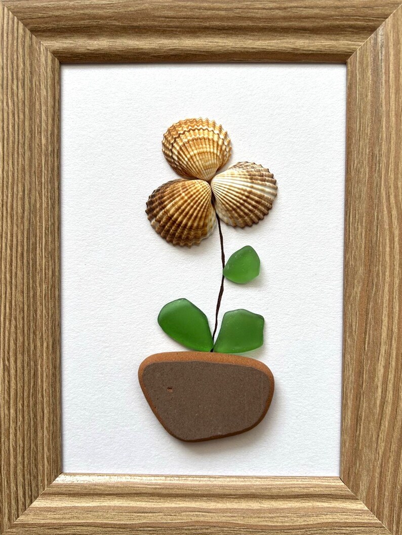 A Pretty Flower Made With Seashells and Seaglass Pieces Collected From ...