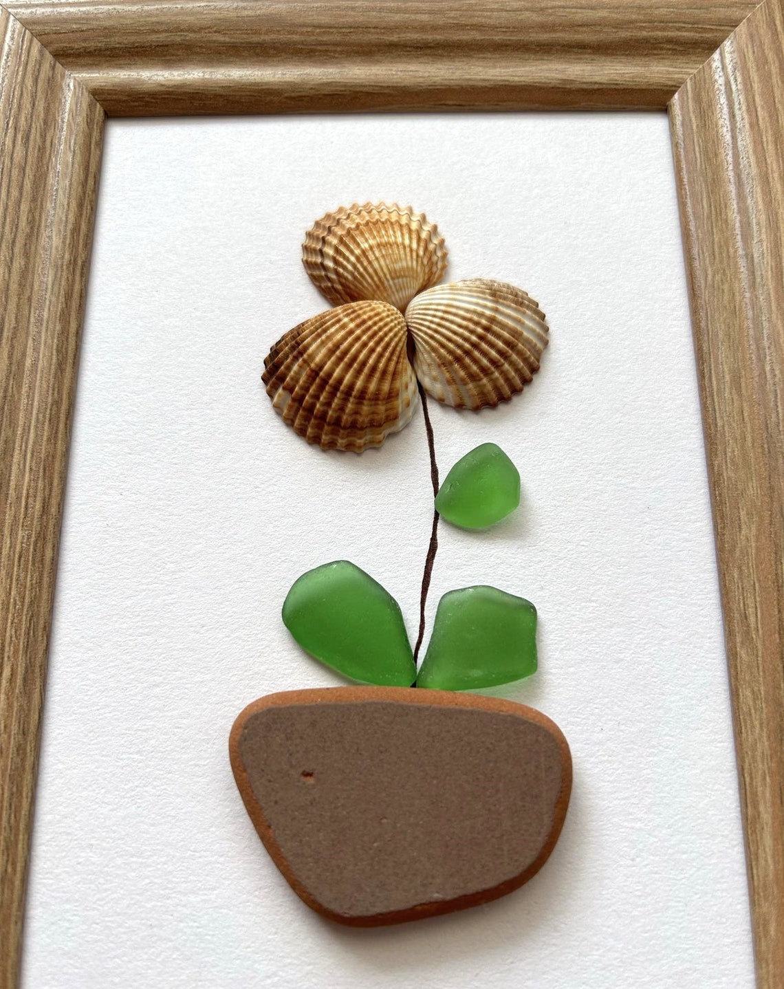 A Pretty Flower Made With Seashells and Seaglass Pieces Collected From ...