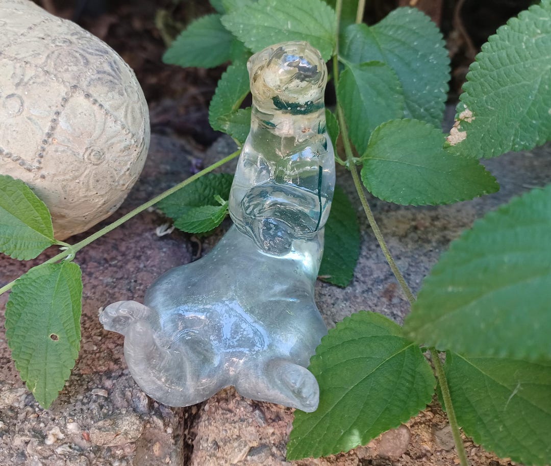 Glossy Silvery Sitting River Otter Resin Figure With Dried Flowers ...