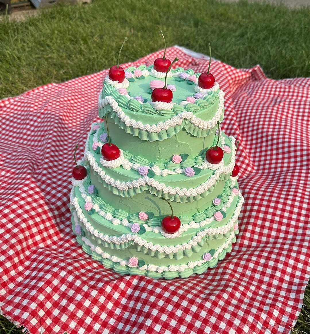 Vintage-style Green Three Tier Fake Cake With Pink and Purple Roses and ...