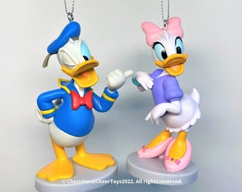 Hallmark Disney Wireless Band / Daisy Duck Playing the Flute / Musical ...