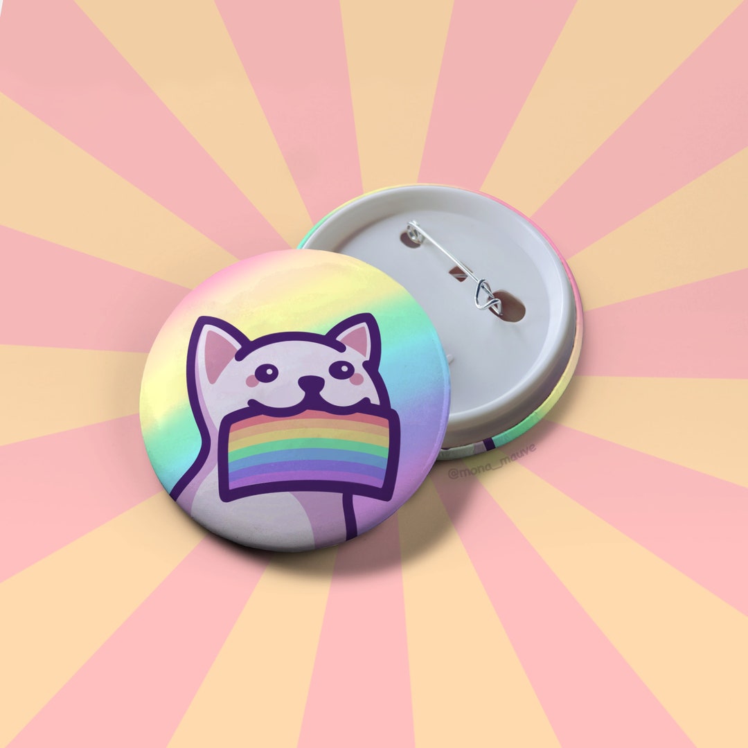 LGBTQ+ Pride Button Badge | Cute Cat Holding a Rainbow Pride Flag ...