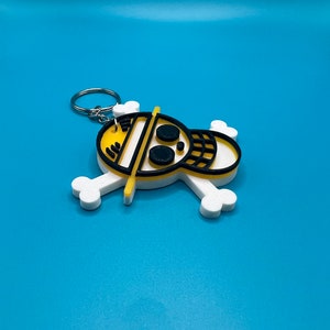 Anime Jolly Skull and Bones Keychain - Etsy