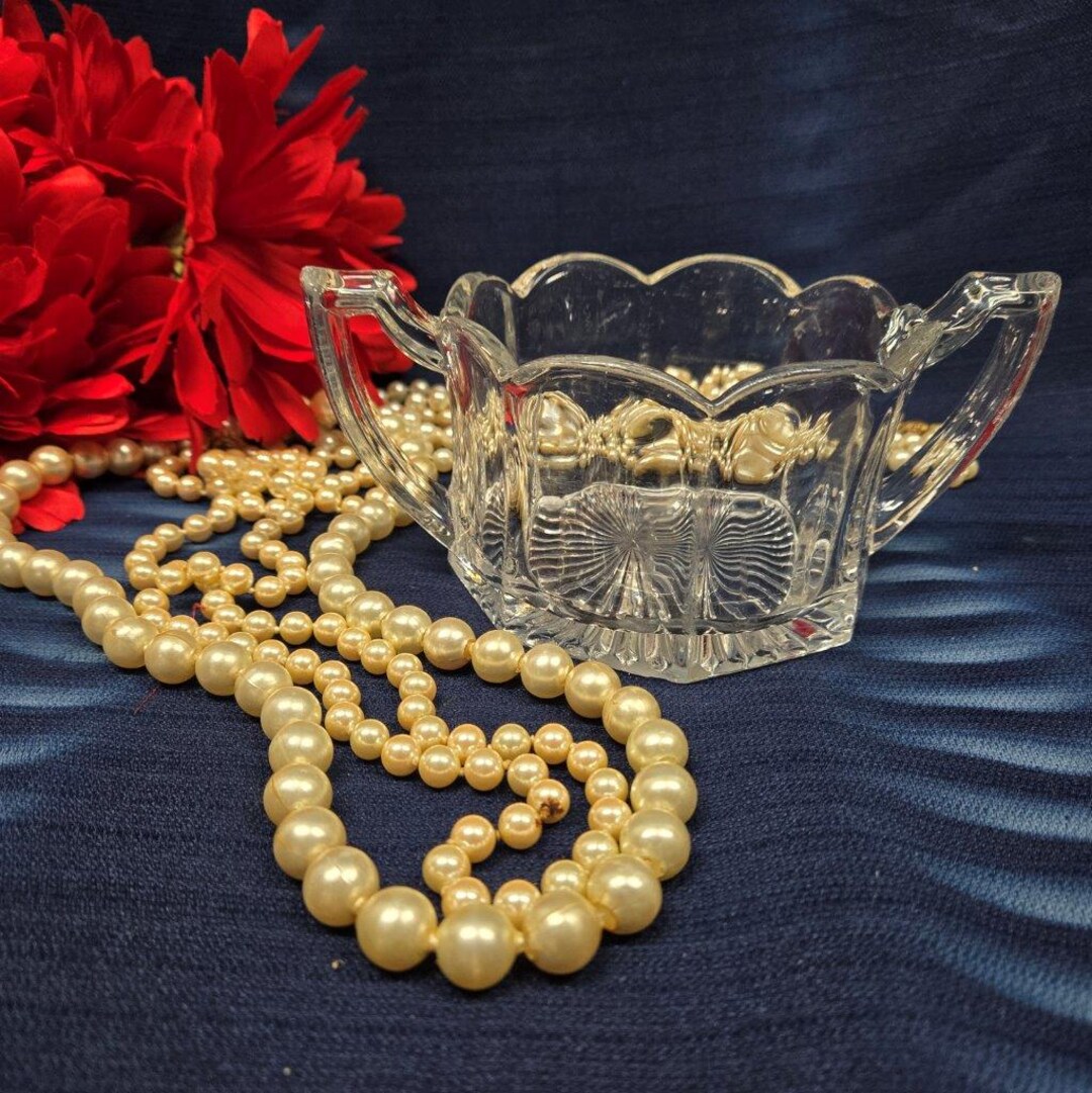 Clear Handled Glass Bowl With Ruffled Edge Design and Handles ...