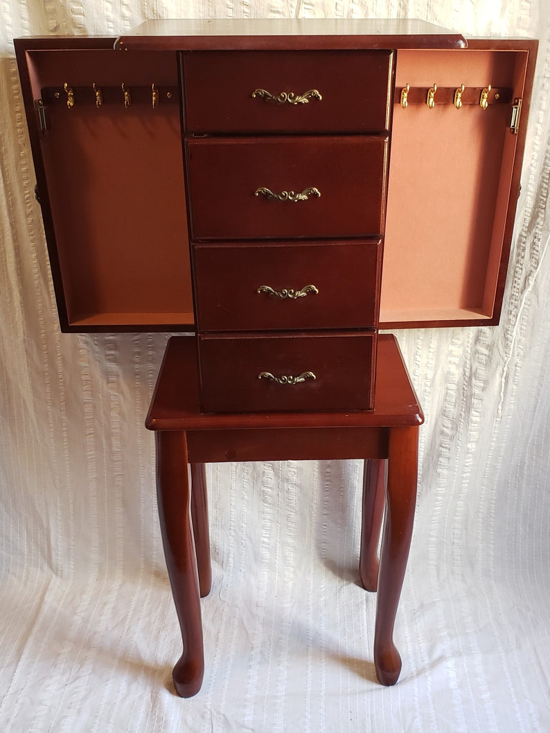 Wooden Floor Standing Jewelry Armoire With Cubbies, Drawers, Mirror ...