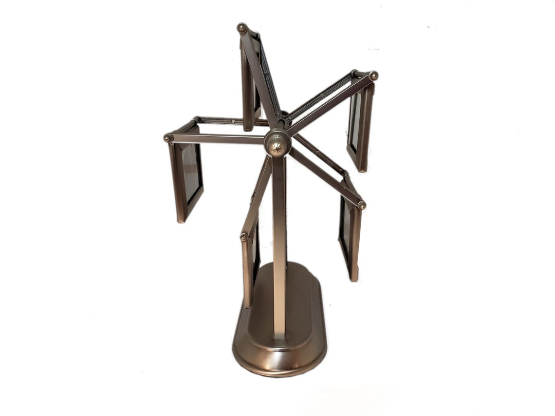 Rotating Metal Picture Frame Display - Turning Display - Metal Picture ...