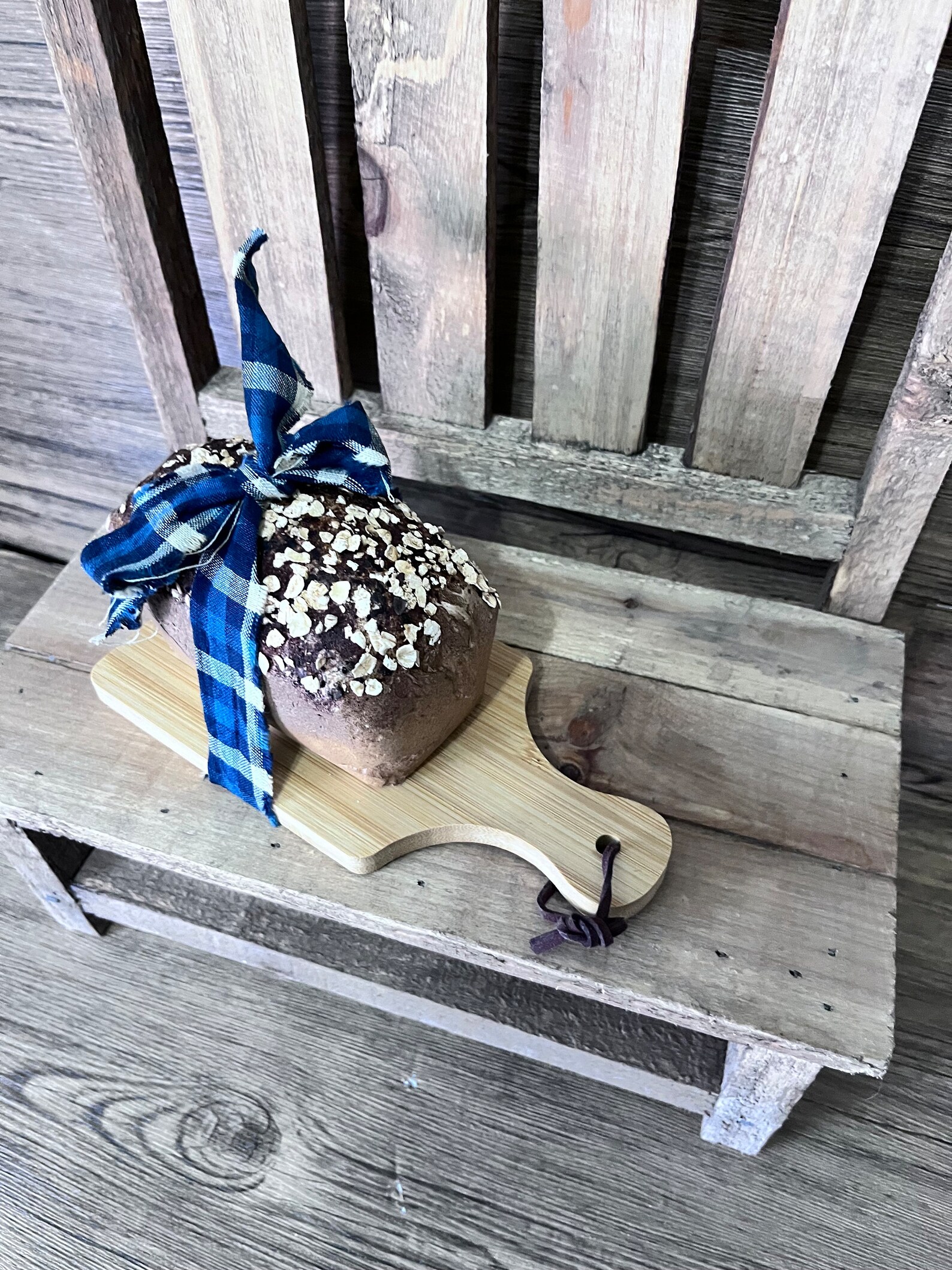 Faux Bread Loaves With Oatmeal Topping on Cutting Board or in Baking ...