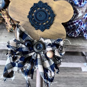 Colorful Wooden Flowers With Clock Faces and Cloth Bows, Buttons, Beads ...