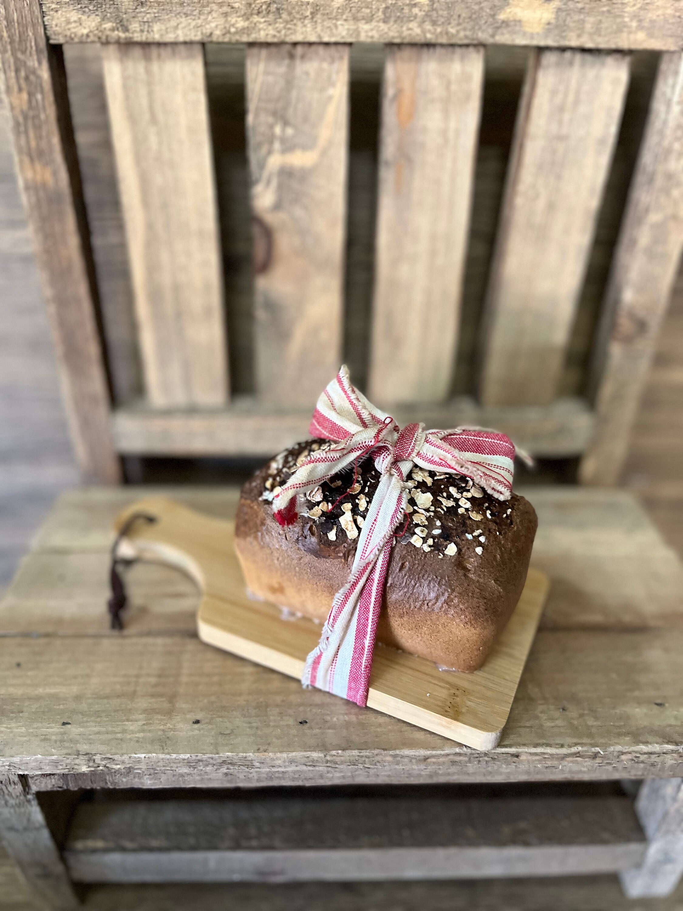 Faux Bread Loaves With Oatmeal Topping on Cutting Board or in Baking ...