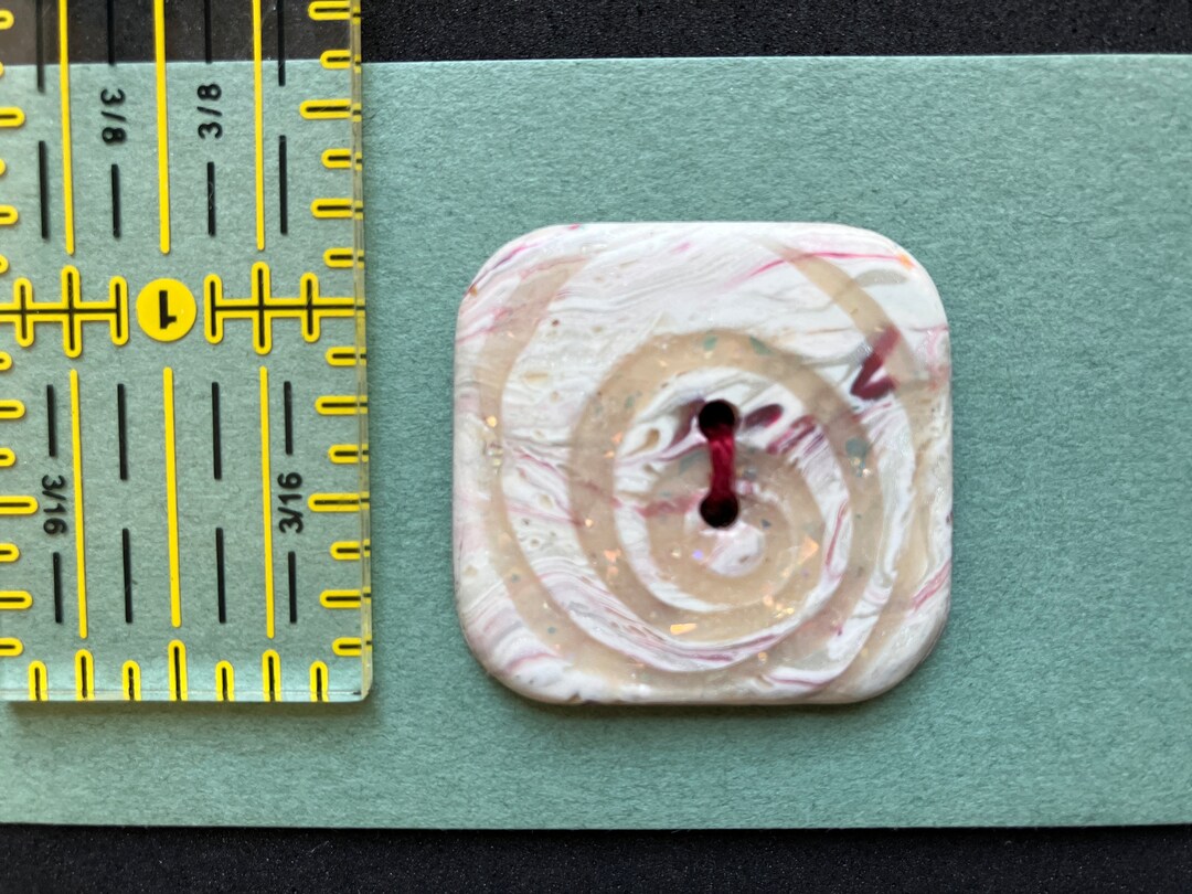 Sparkly Opal Spiral Button. Creamy Marble Background Color. Rounded ...