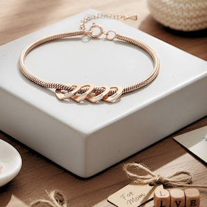 3 interlocking hearts bracelet