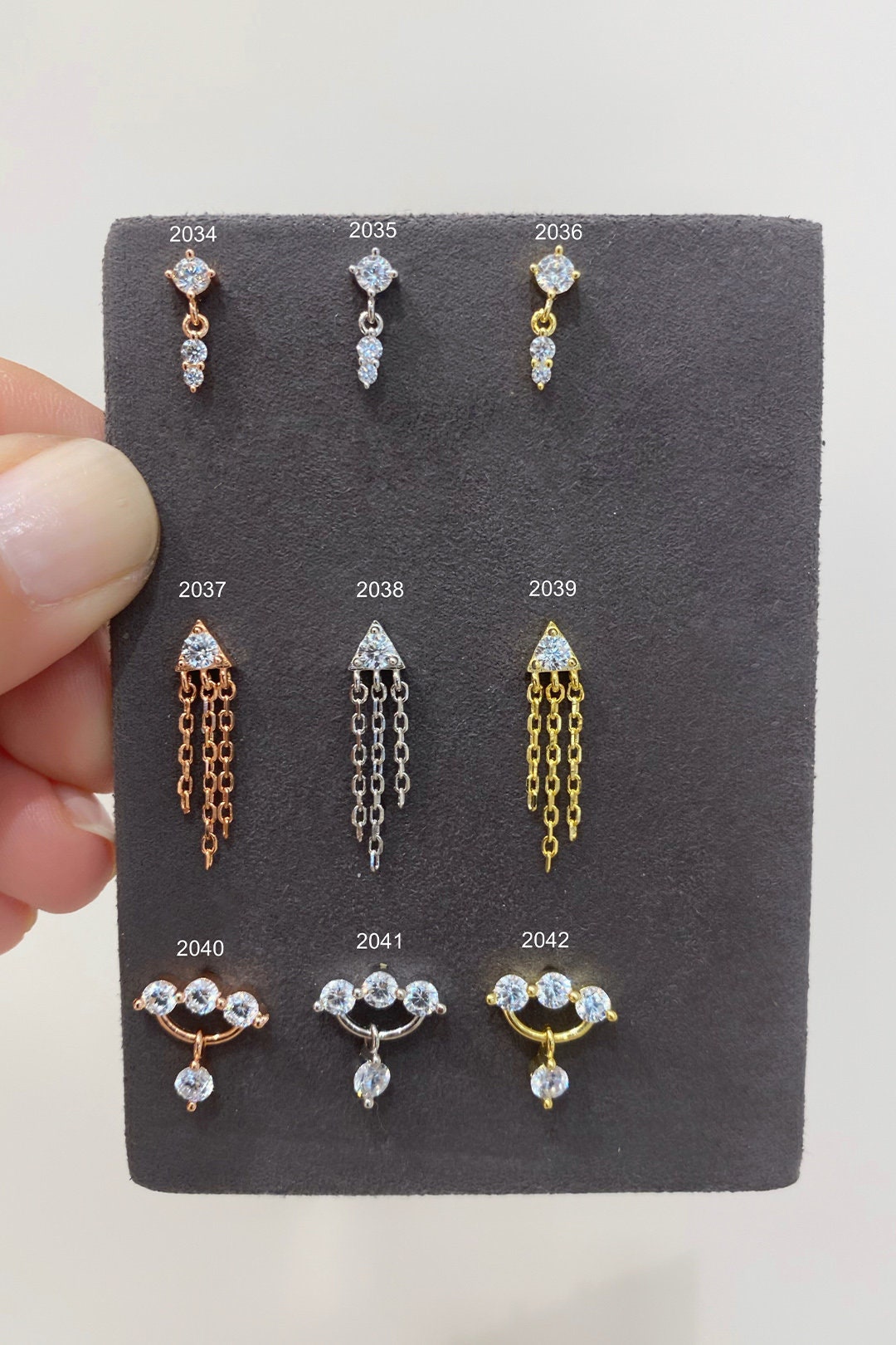 Triangle With Chain Piercing,three Solitaire Piercing,helix Piercing ...