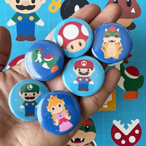 Video Game Set Buttons. Inspired Mario Bros Pin Back Button. Set Six ...