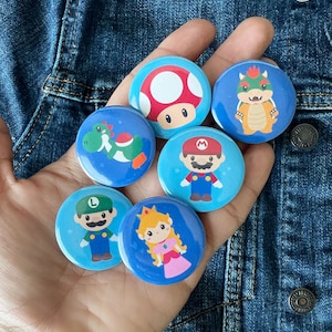 Video Game Set Buttons. Inspired Mario Bros Pin Back Button. Set Six ...
