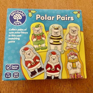 Christmas Pass the Parcel Polar Pairs Card Matching Game & 9 Novelties ...