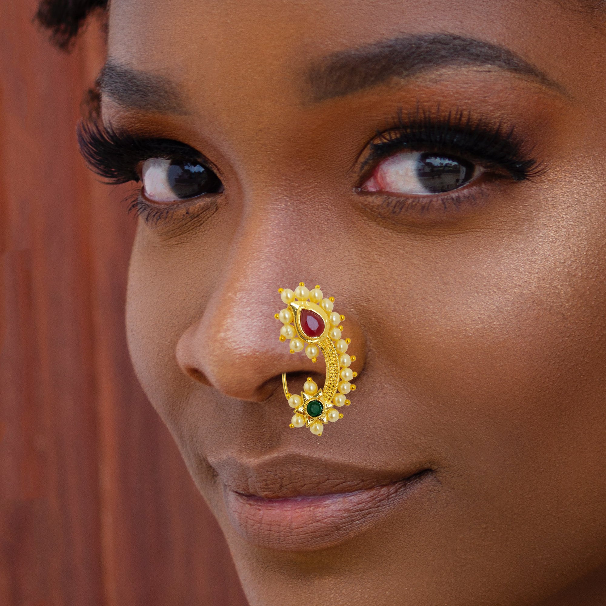 Gold instumental bengali highest nose pin design