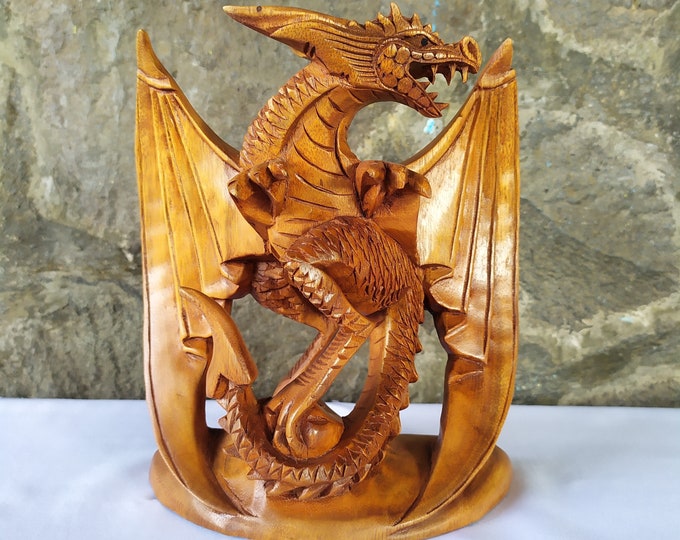 Wooden Dragon Statue. the Dragon Statue Stands on the Rock. Dragon ...