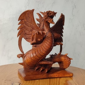 The Winged Dragon Statue is Made of Natural Wood. Dragon Statue. Wood ...