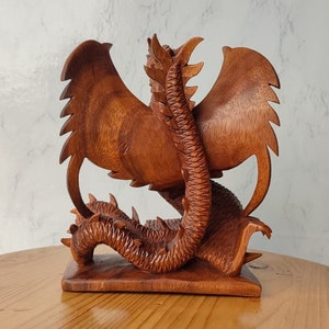 The Winged Dragon Statue is Made of Natural Wood. Dragon Statue. Wood ...