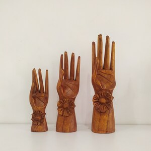 Wooden Hand Sculpture With Flower Decoration , Wooden Hand Jewelry ...