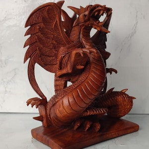 The Winged Dragon Statue is Made of Natural Wood. Dragon Statue. Wood ...