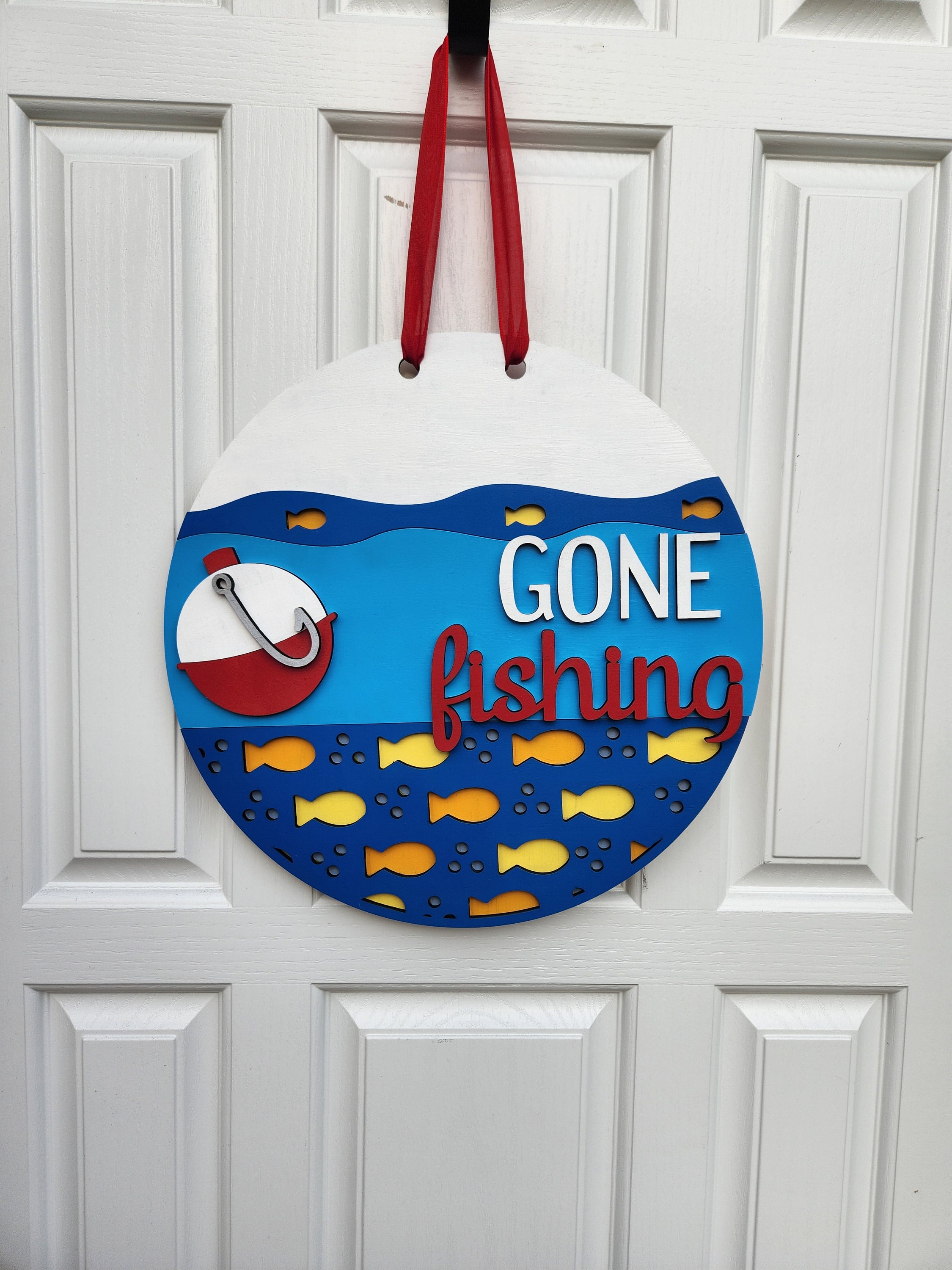 Gone Fishing Sign On Door