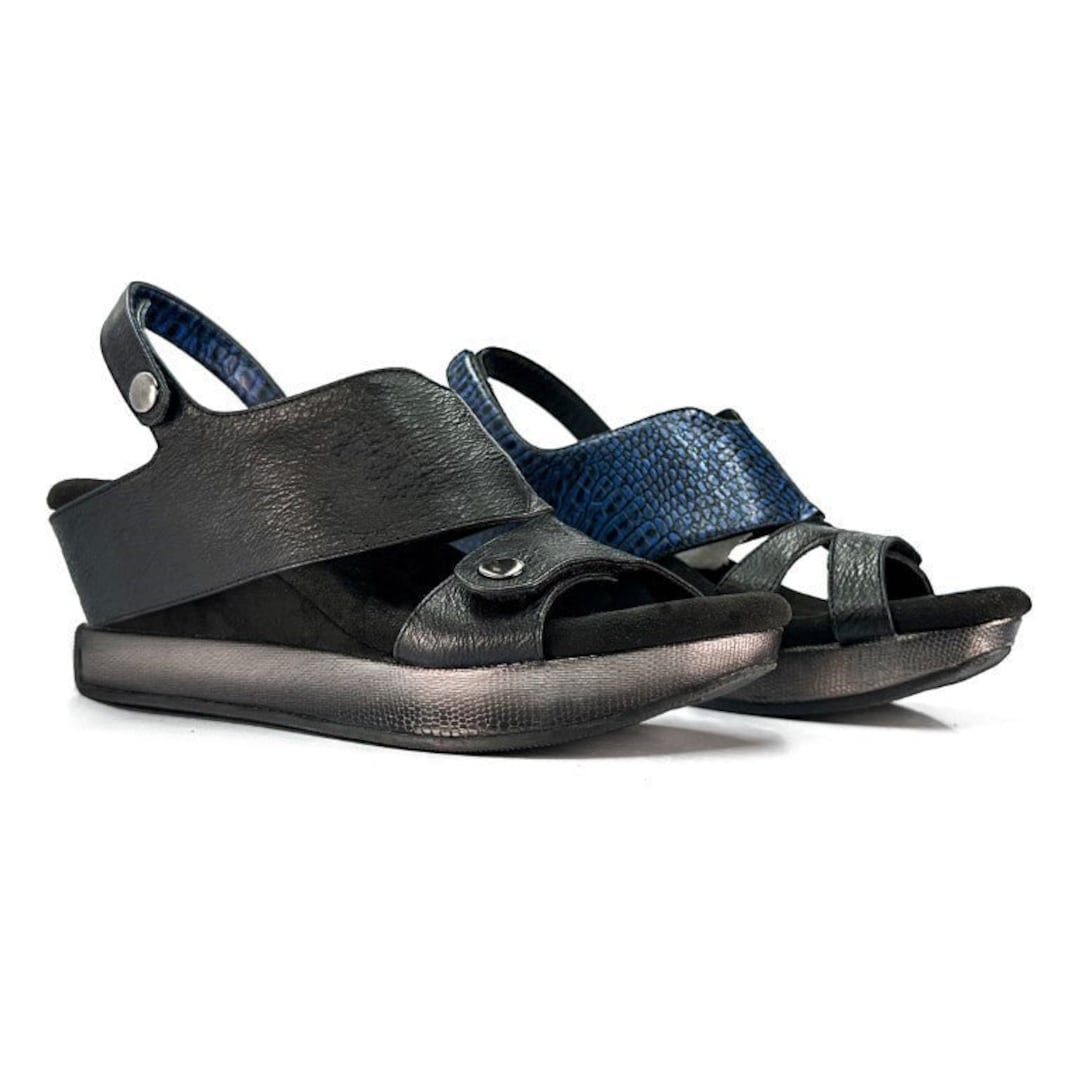 Modzori Women’s Krista Reversible Vegan Wedge Sandal - Black Flips to ...