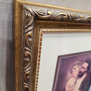 St. Joseph in the Workshop Holding the Child Jesus Custom Framed Print ...
