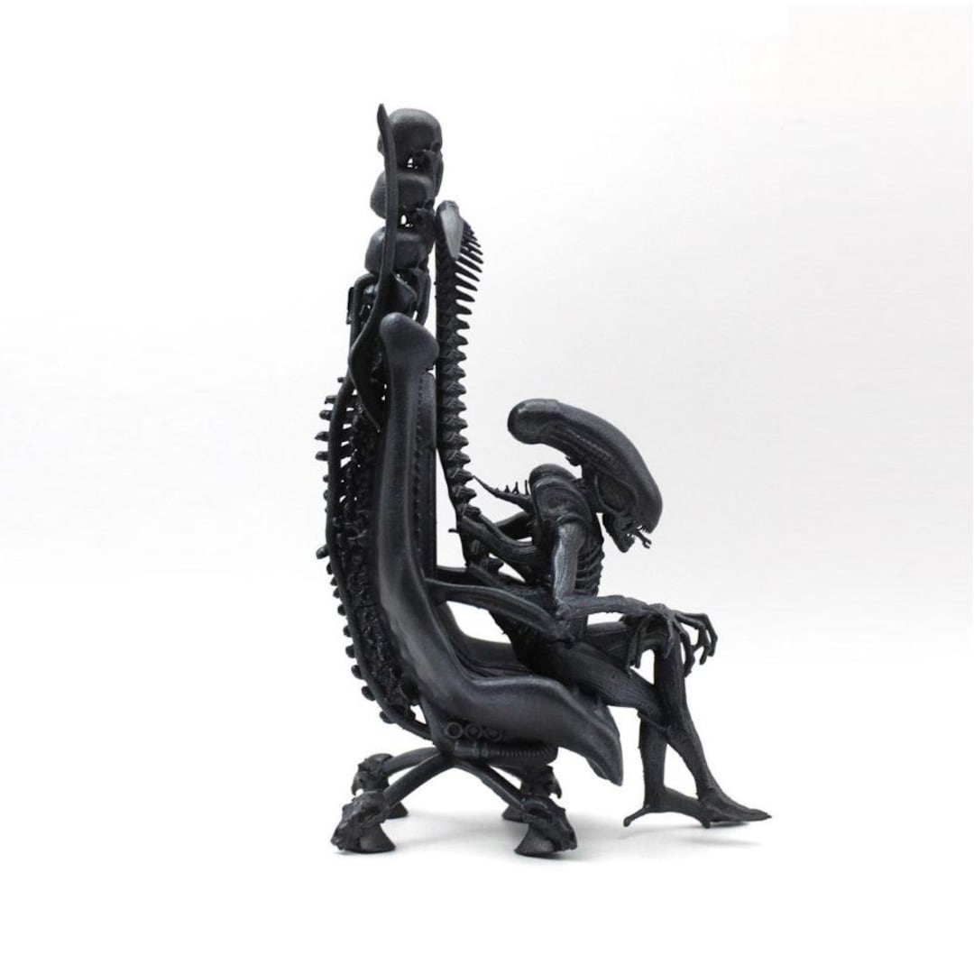 Parental ALIEN WARRIOR Sitting in an HR Giger Harkonnen Capo Chair ...