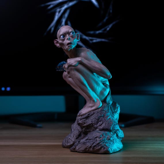 Gollum Crouching On Rock
