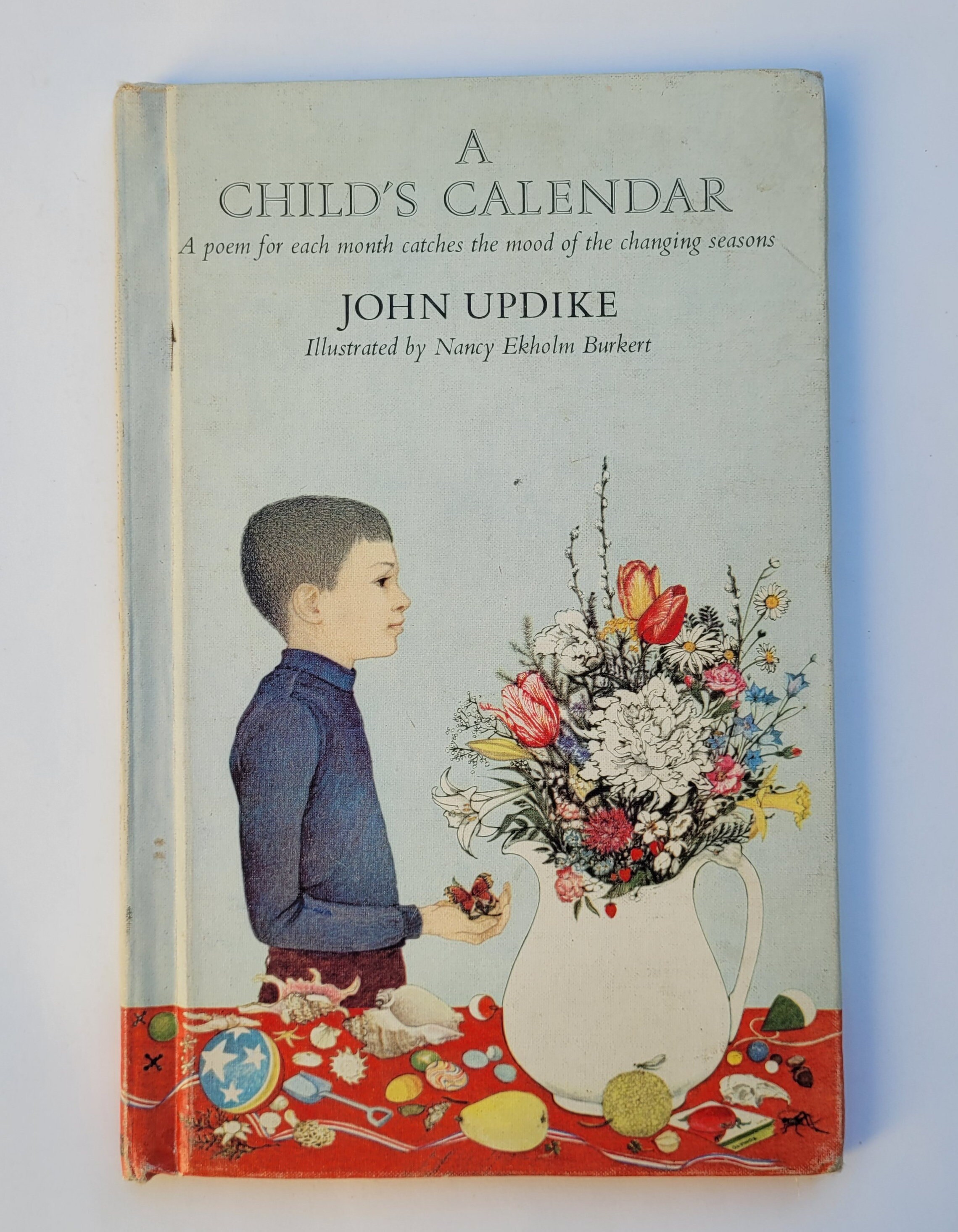 A Child's Calendar by John Updike Illustrated by Nancy Elkholm Burkert ...