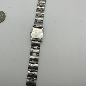 Vintage Seiko 1N00 RARE Ladies Tank Watch Sqaure Black Face Silver Tone Small Gift Her Women Mom ...