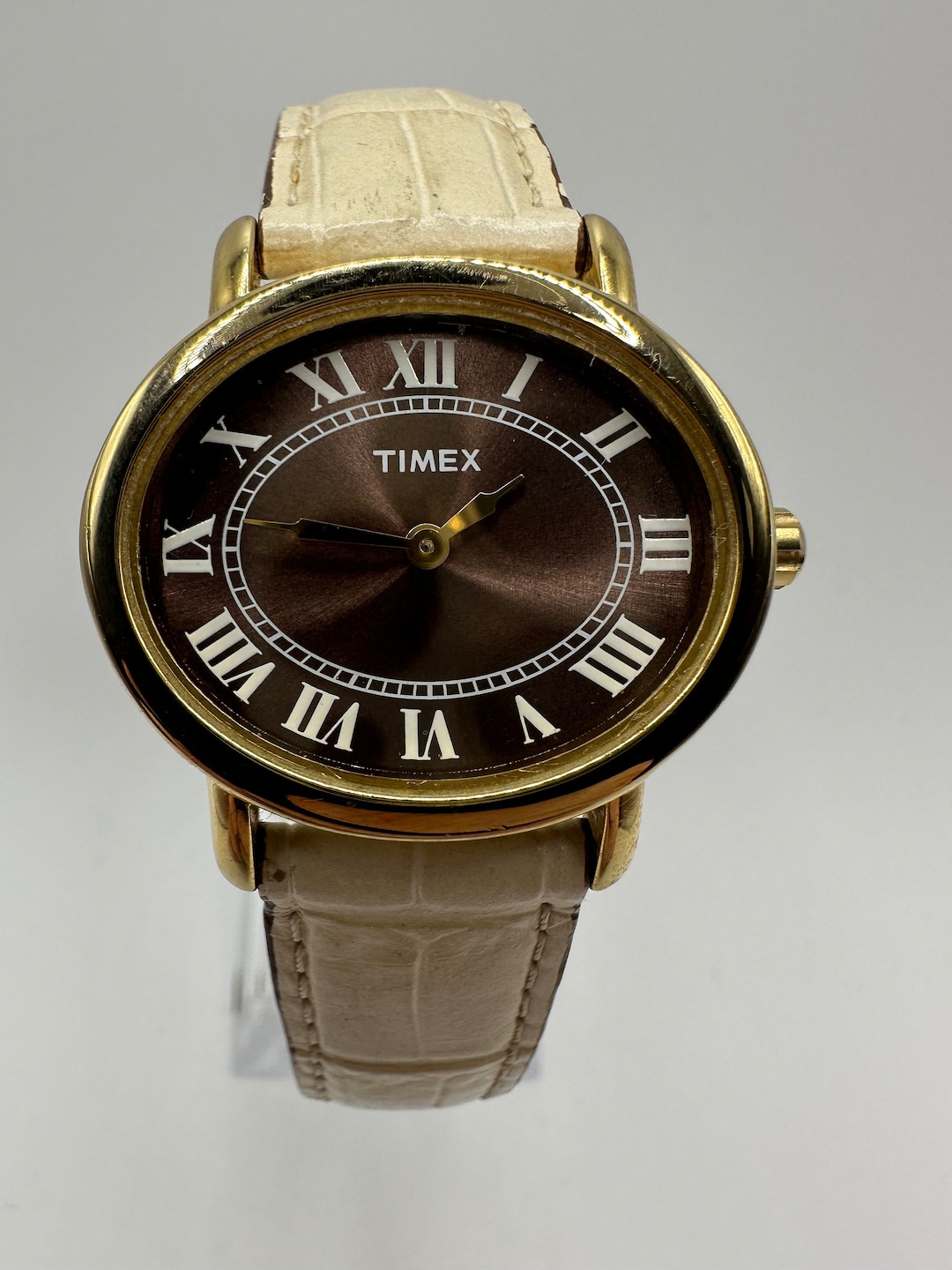Vintage Timex Ladies Gold Tone Oval Watch White Leather Roman Numerals ...