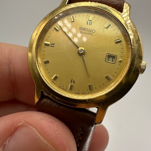 Vintage Seiko 7N89 Ladies Circle Gold Tone Dress Watch Faux Brown Leather Strap Gift Her Mom ...