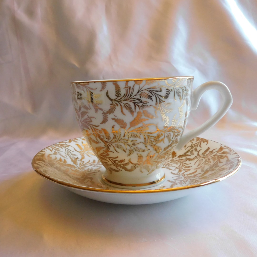 White Bone China Footed Teacup and Saucer With Gold Leaf Design 21320 ...