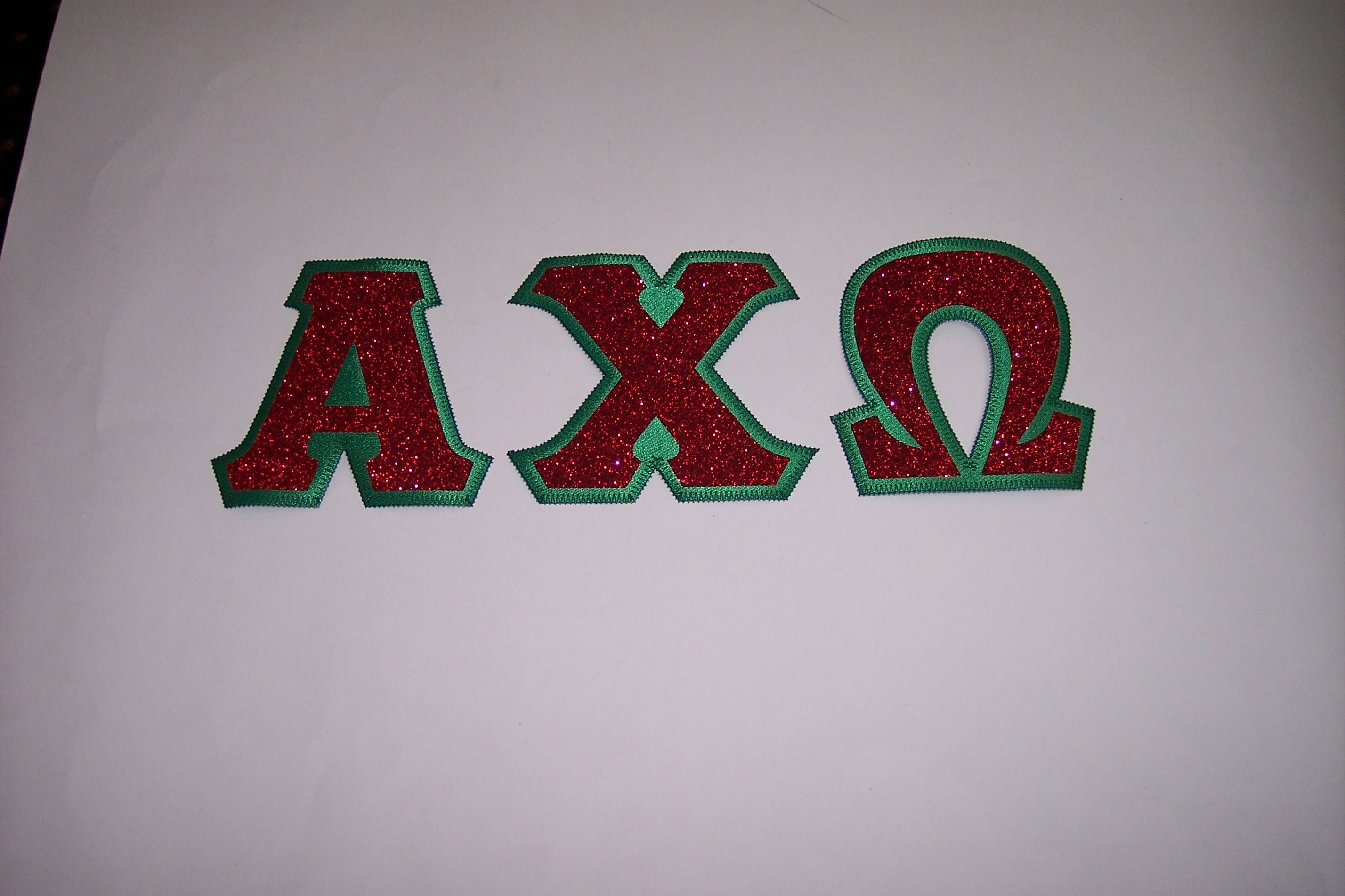 Axo Greek Letters
