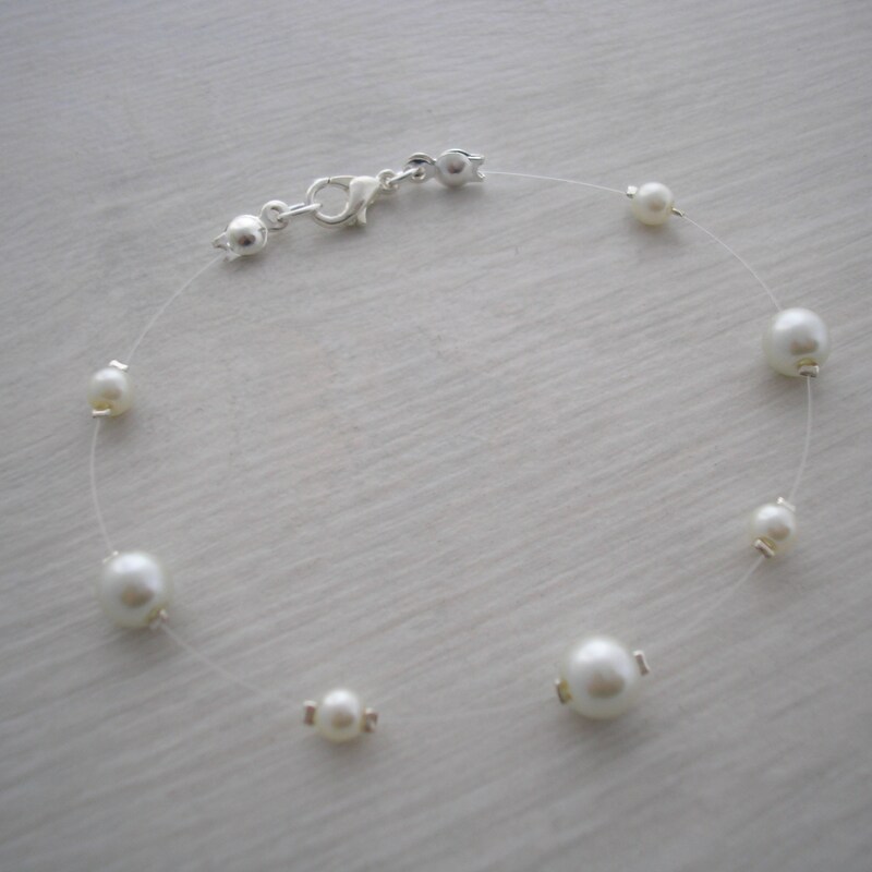 Floating Bracelet - Etsy