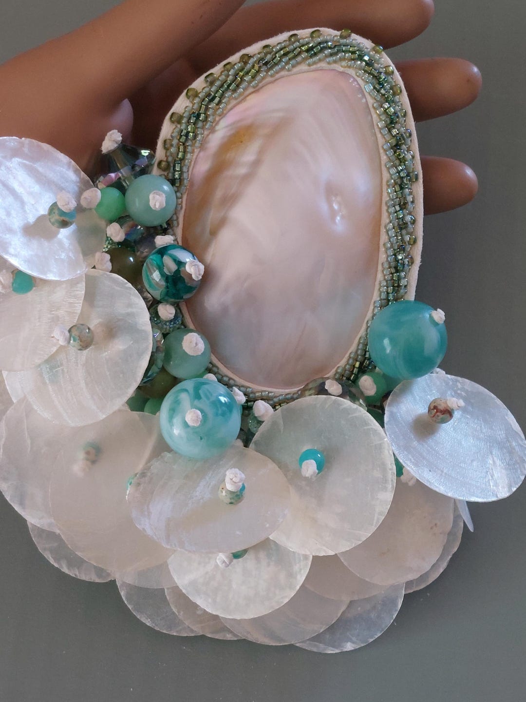 Irradescent Whole Clam Shell With Shell Discs Beaded White Deerskin ...