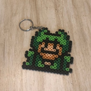Super Mario Bros 3 Mini Luigi Keychains | Magnets | Racoon Luigi ...