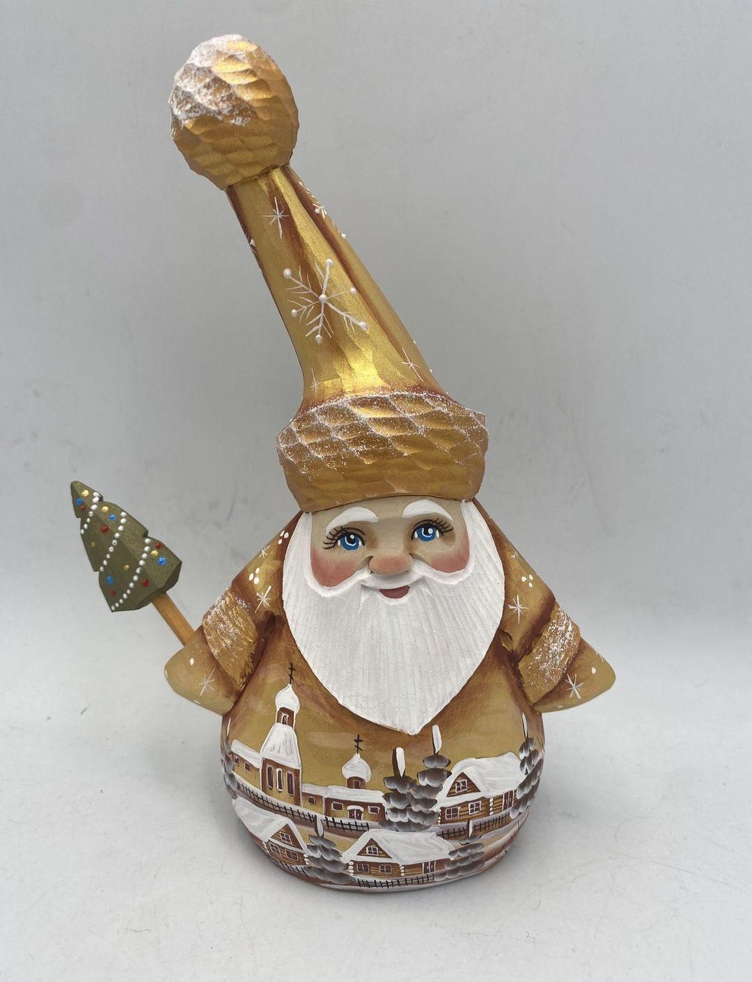 Festive Wooden Figure Golden Santa Claus With a Christmas Tree in His ...