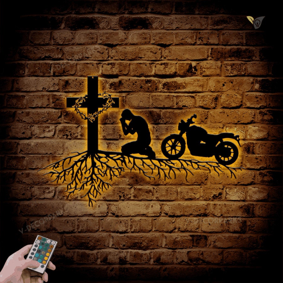Biker Praying To Cross