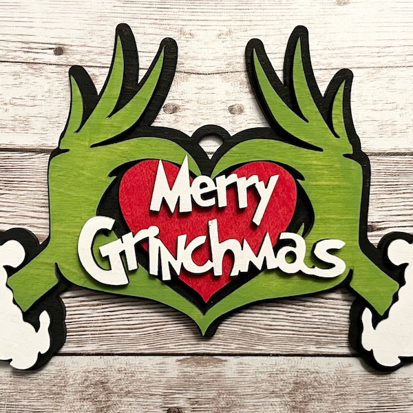 Grinch mano corazon - Etsy México