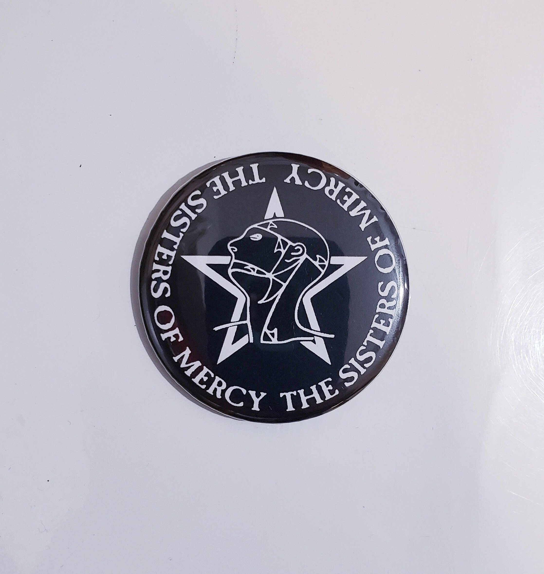 Sisters Of Mercy Logo