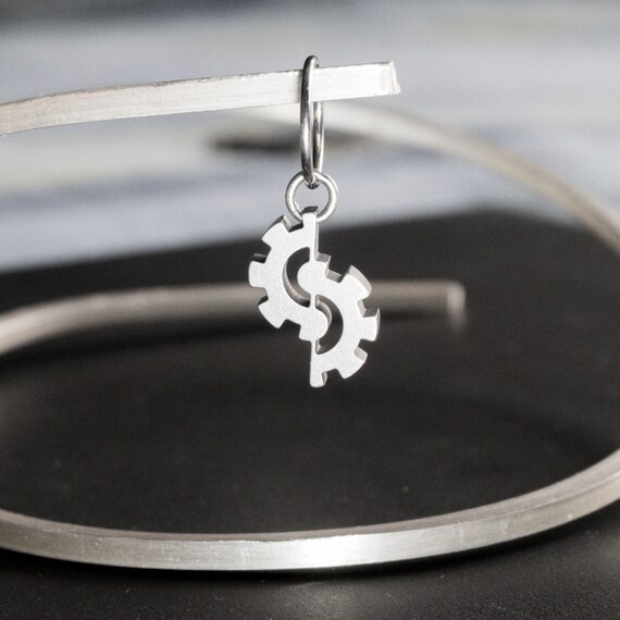 Vanitas Earring Titanium - Etsy